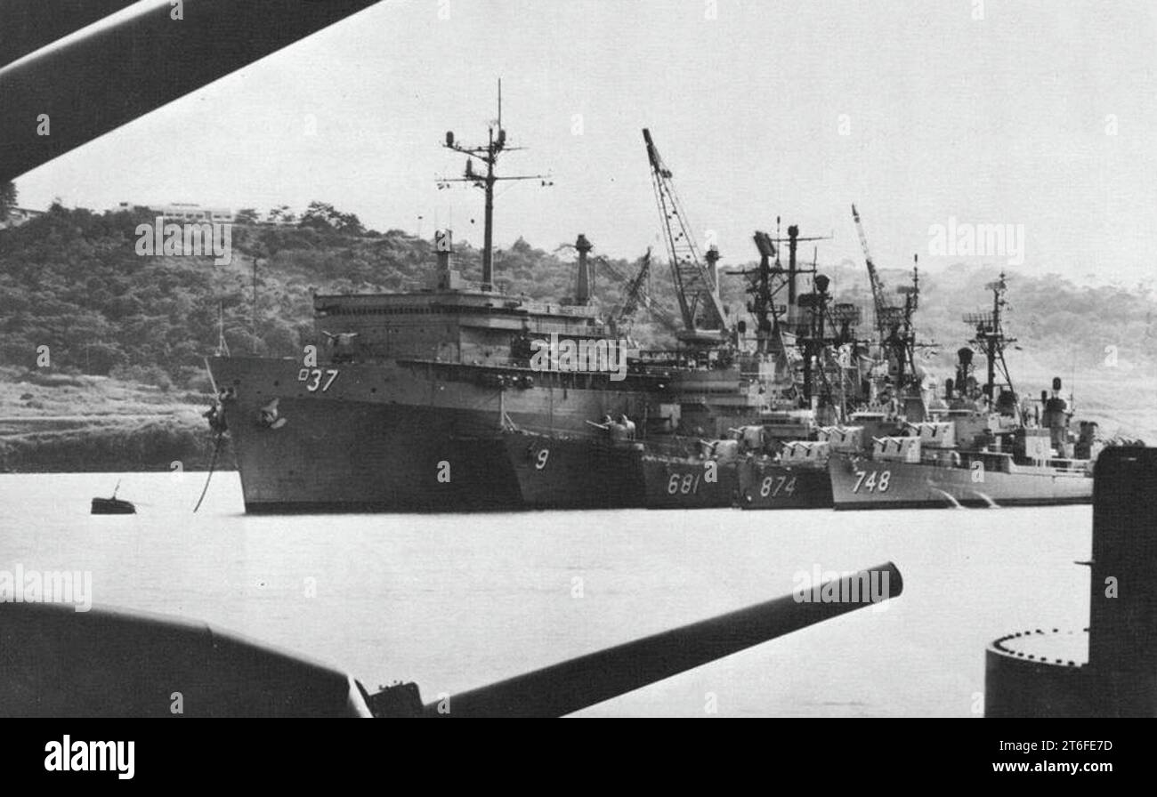 USS Samuel Gompers (AD-37) at anchor with destroyers alongside, circa ...