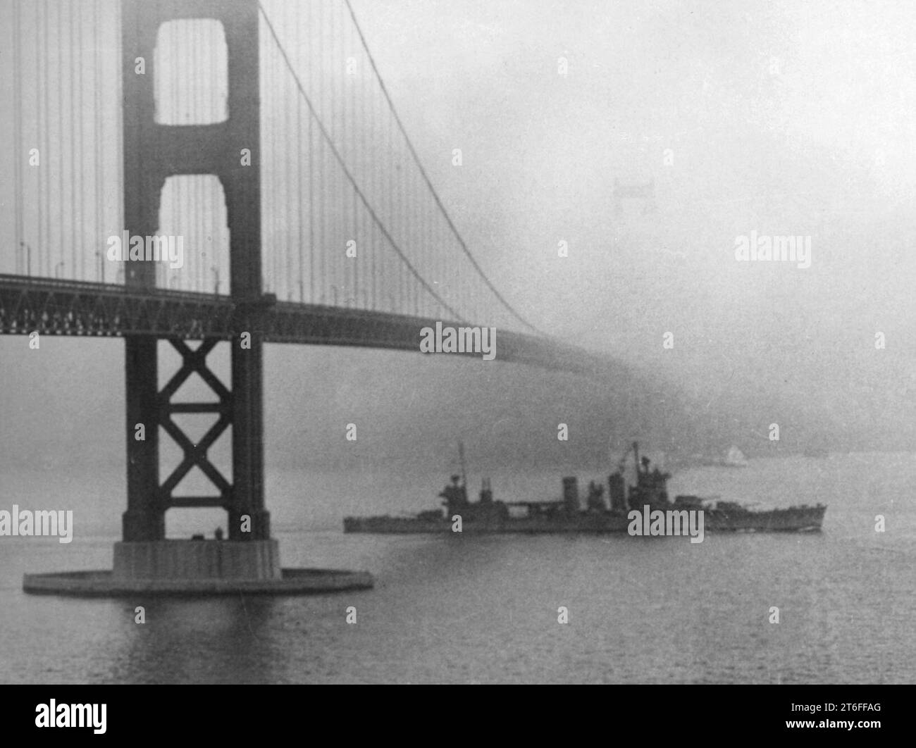 USS San Francisco (CA-38) steams under the Golden Gate Bridge on 11 ...