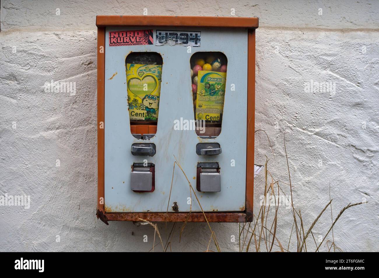 Chewing gum vending machine from the 1950s on a house wall, Franconia ...