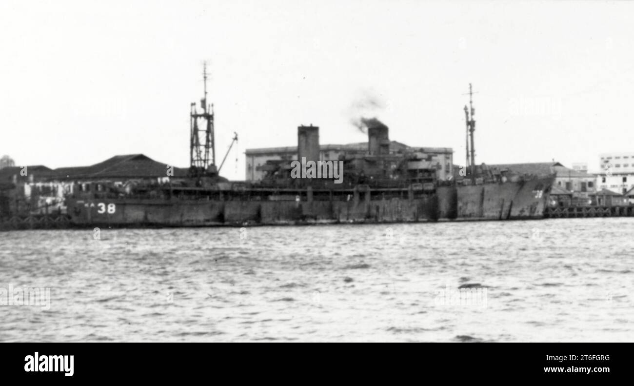 USS Sappho (AKA-38) docked at Shanghai, China, in late 1945 Stock Photo ...
