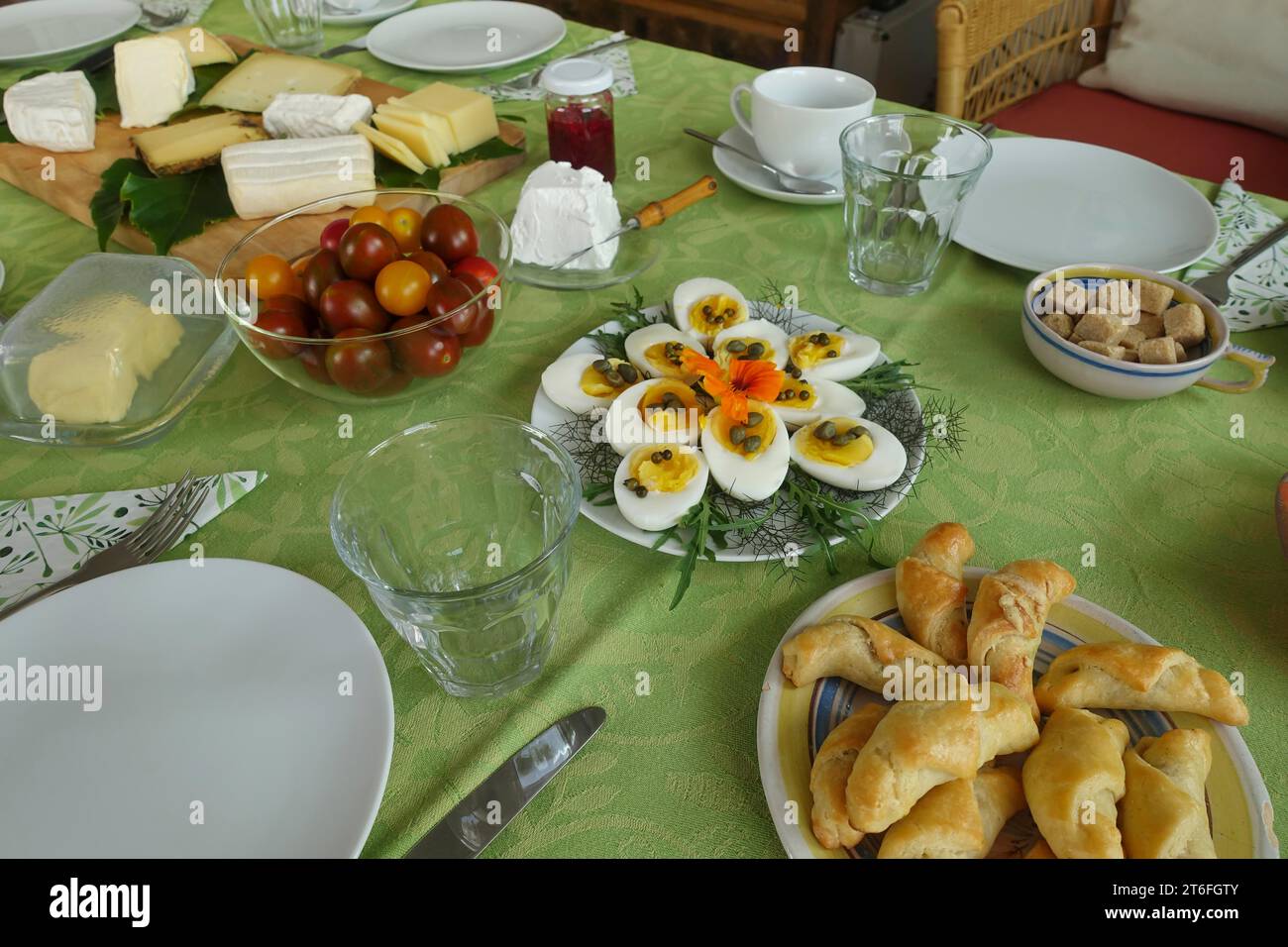 Breakfast table, breakfast, cold buffet, tomatoes in glass bowl, cheese ...