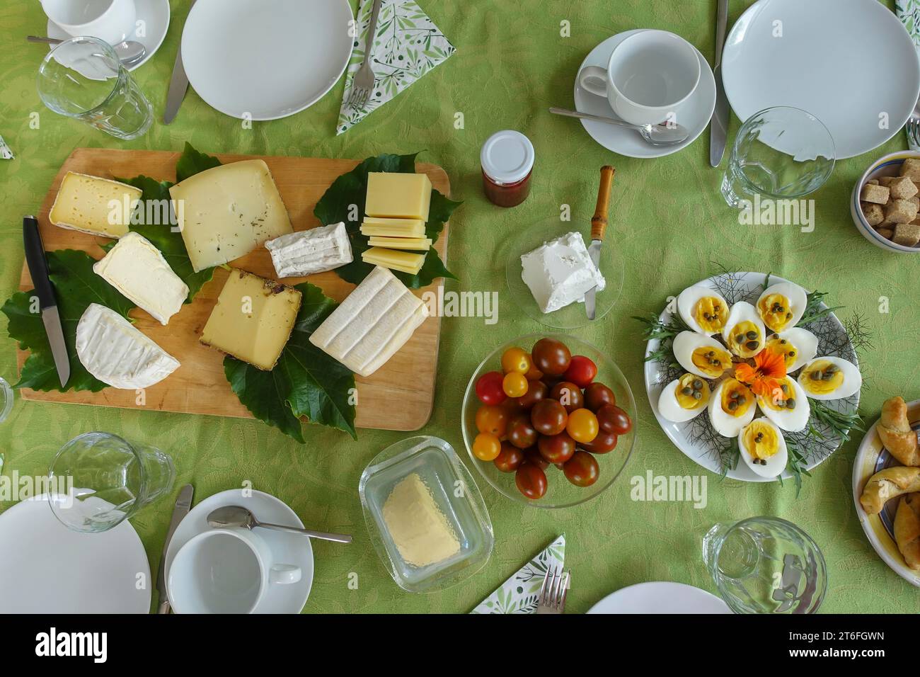 Breakfast table, breakfast, cold buffet, tomatoes in glass bowl, cheese ...