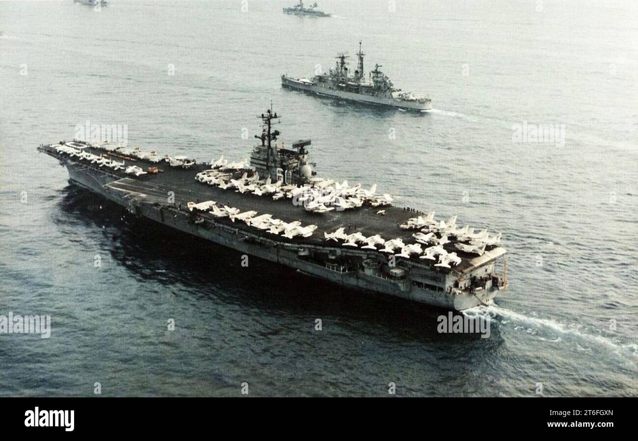 USS Saratoga (CV-60) and USS Little Rock (CG-4) underway in the ...