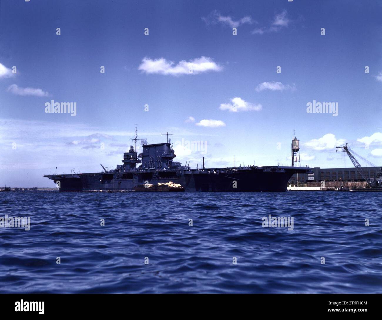 USS Saratoga (CV-3) at Pearl Harbor, Hawaii, circa in July 1942 Stock ...