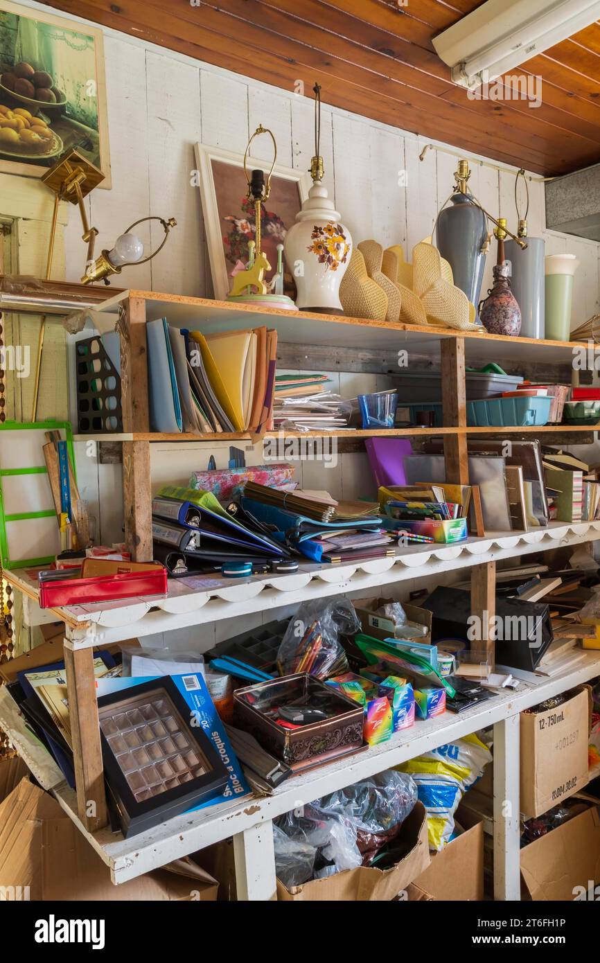 Paintings, lamps and stationary items for sale inside second hand goods ...