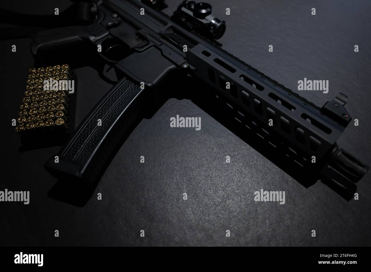 Modern Elegant Assault Rifle and Bullet on Grey Background in ...