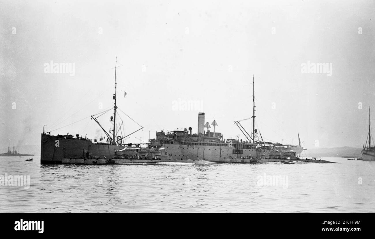 USS Savannah (AS-8) with O-class submarines alongside, circa in 1919 ...