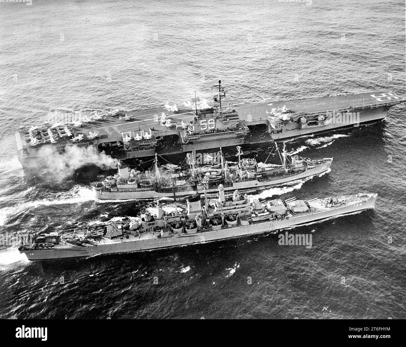 USS Severn (AO-61) refuels the USS Forrestal (CVA-59) and USS Des ...