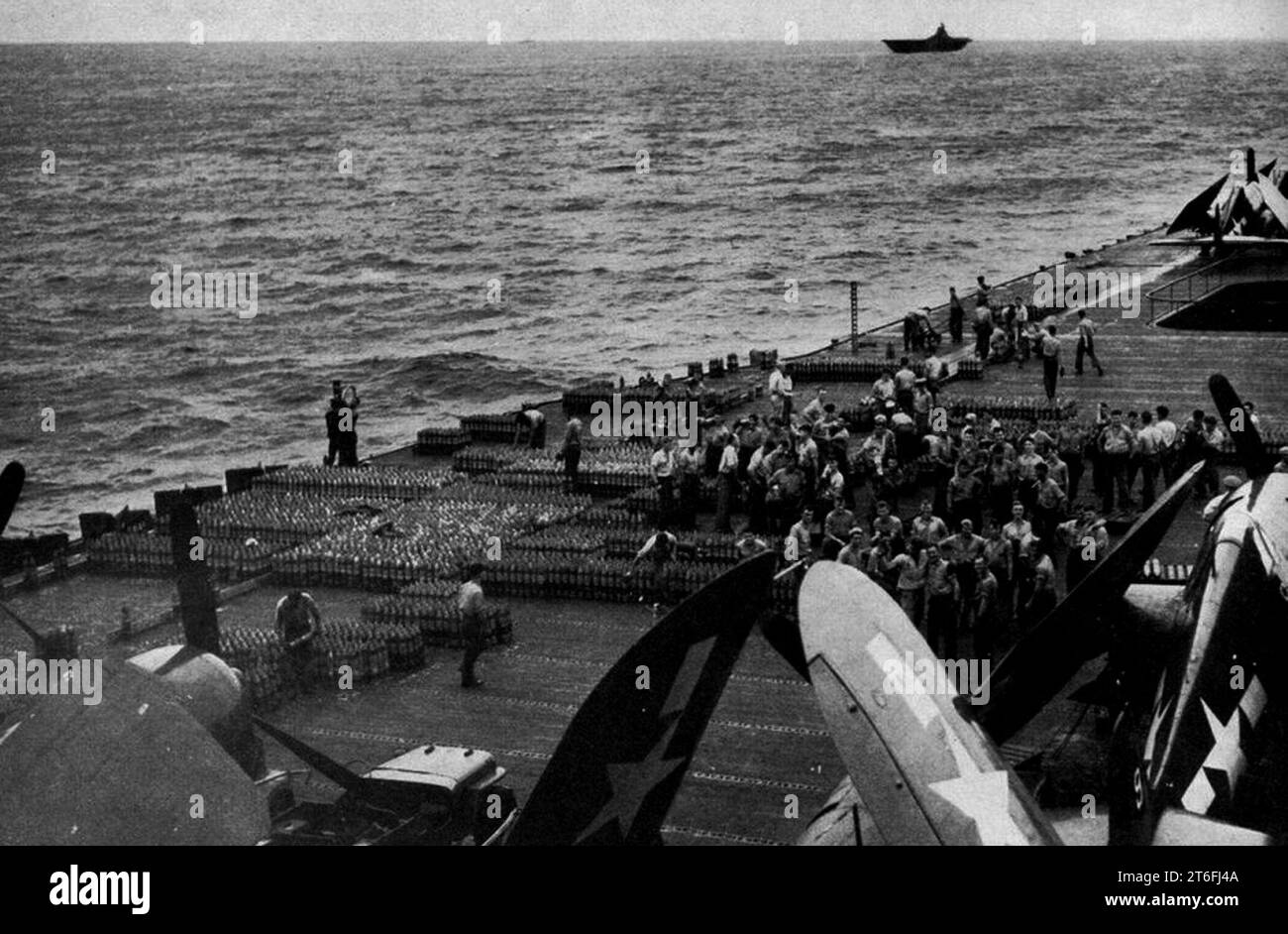 USS Shangri-La (CV-38) loads ammunition, in 1945 Stock Photo - Alamy