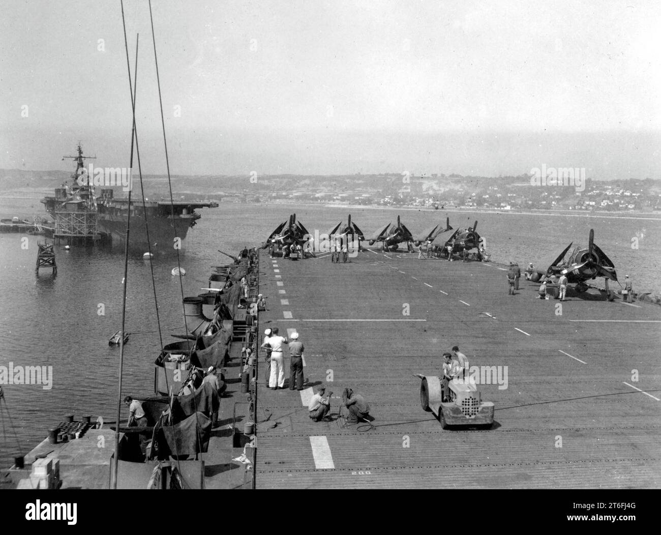 USS Shamrock Bay (CVE-84) and USS Ranger (CV-4) at Naval Air Station ...