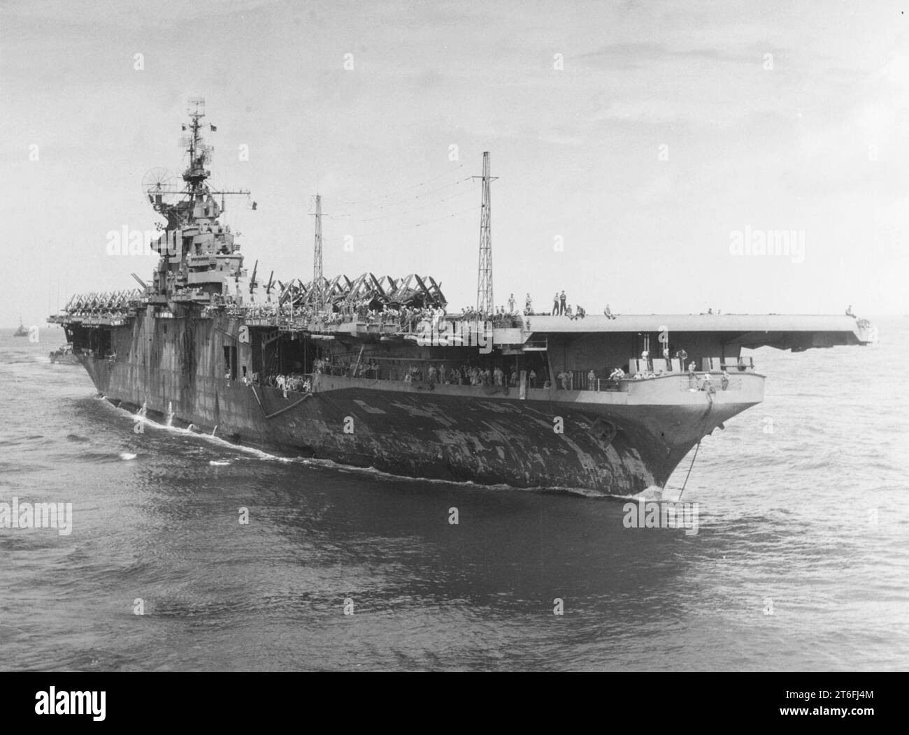 USS Shangri-La (CV-38) comes alongside USS Attu (CVE-102), 1945 Stock ...
