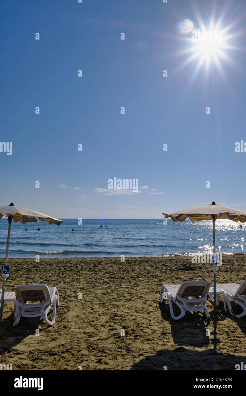 Sun flare over beach in Larnaca, Cyprus Stock Photo - Alamy