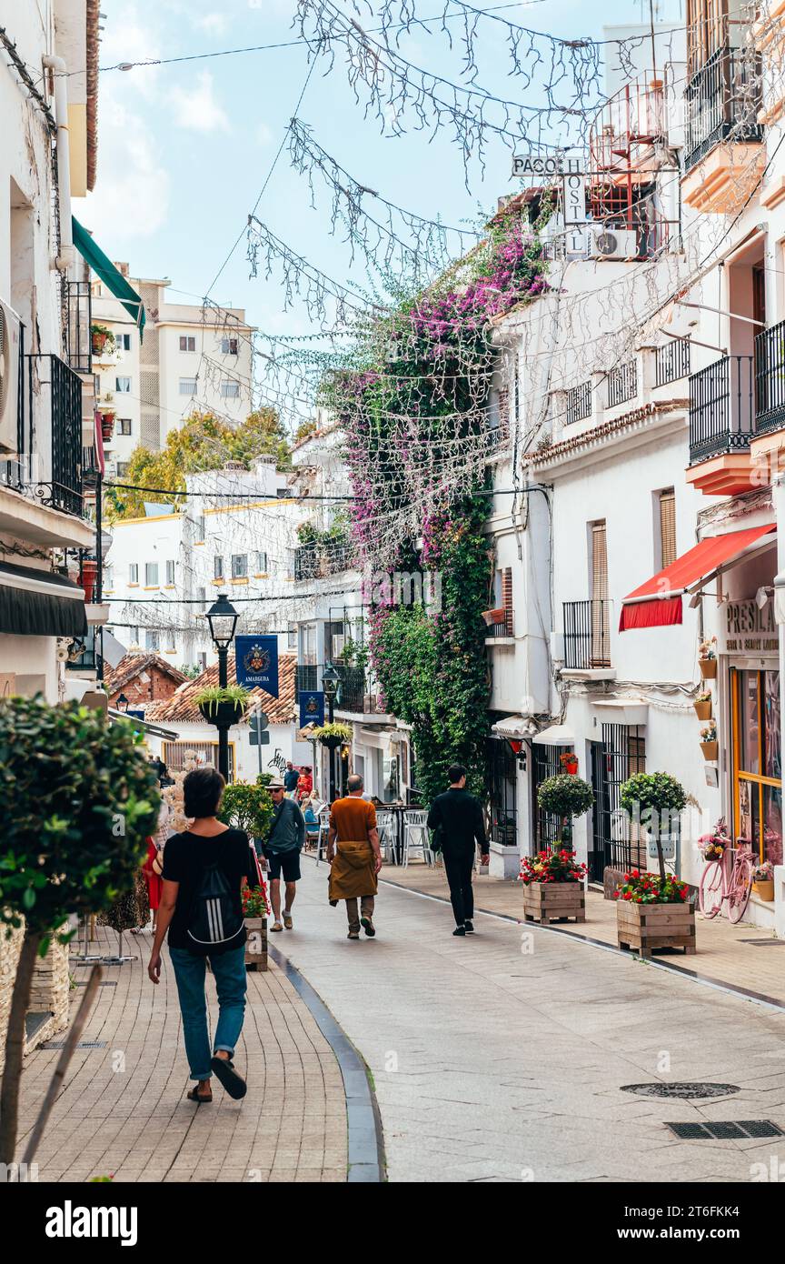 Cafe tables on Streets of Marbella, Spain Stock Photo - Alamy