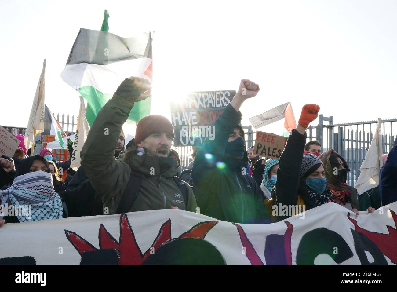 Trade unionists and protesters form a blockade outside weapons ...