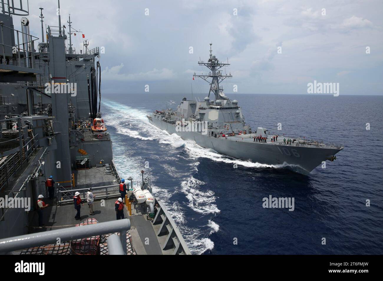 USS Stockdale (DDG-106) approaching USNS Charles Drew (T-AKE-10) during replenishment-at-sea ...