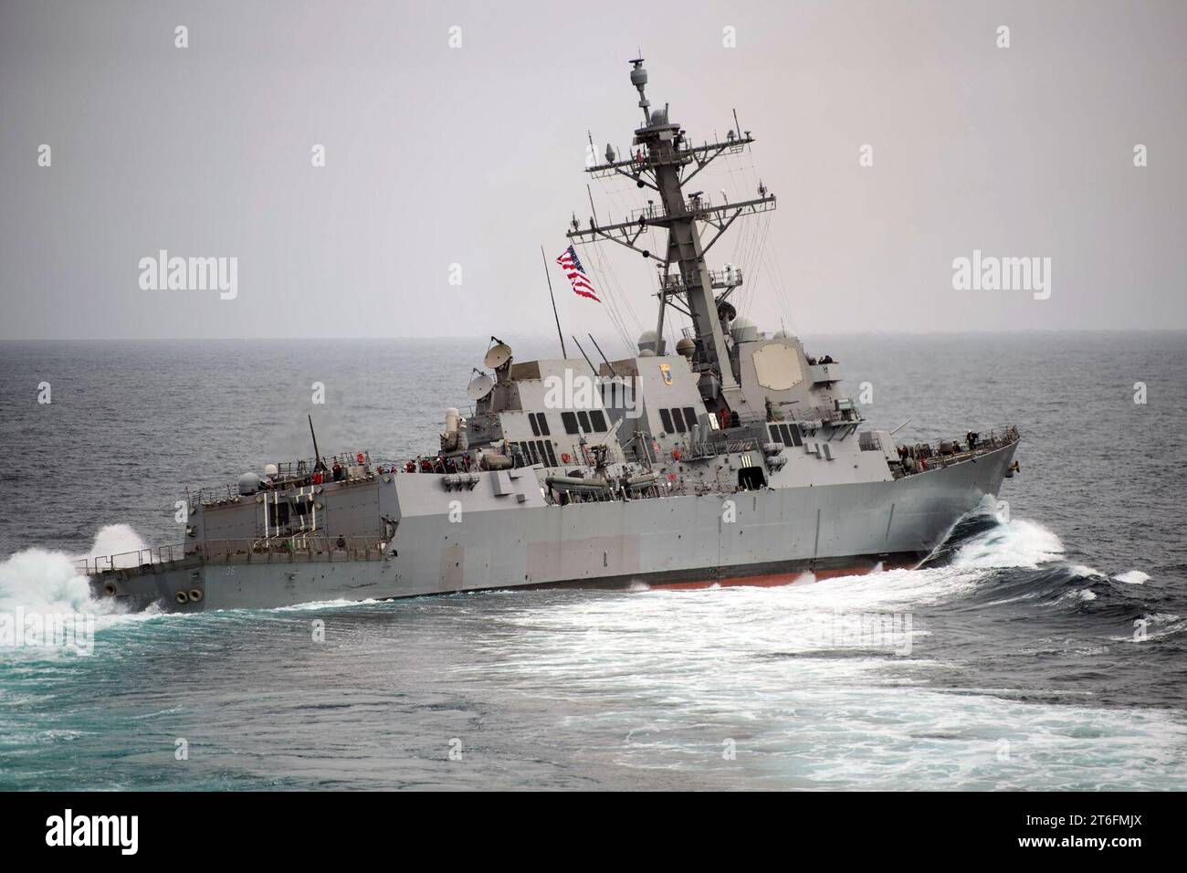 USS Stockdale (DDG 106) maneuvers following a replenishment-at-sea with ...