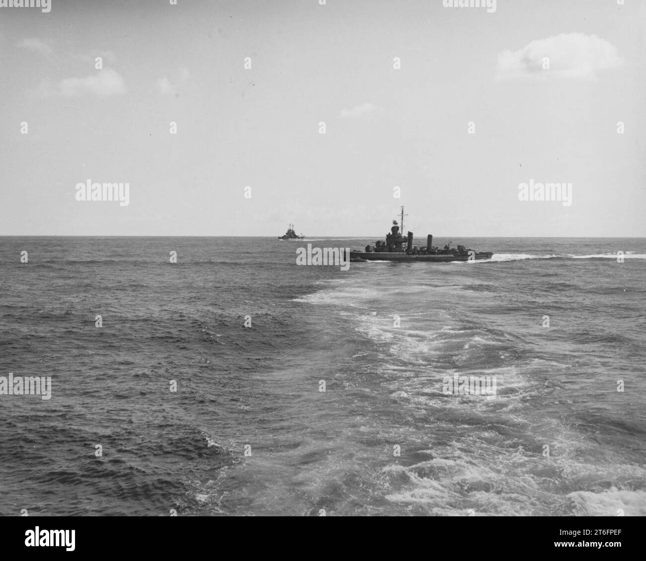 USS Swanson (DD-443) with USS Cleveland (CL-55) in November 1942 Stock ...