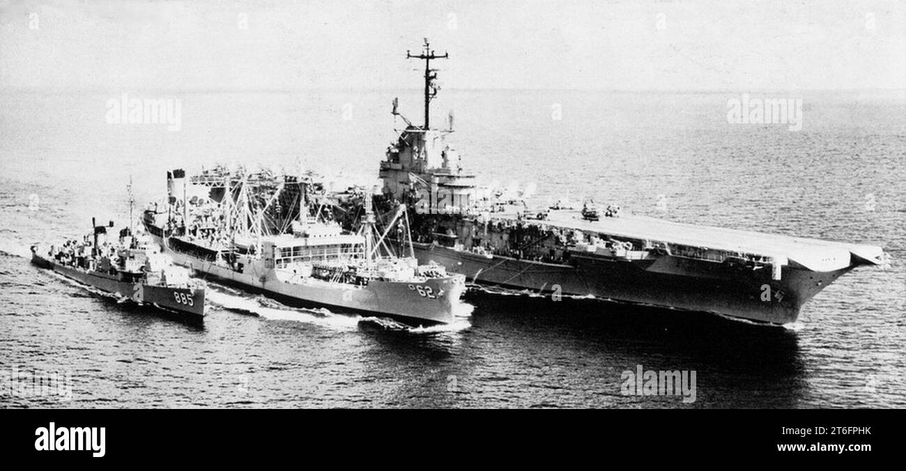 USS Taluga (AO-62) refueling Oriskany (CVA-34) and JR Craig (DD-885 ...