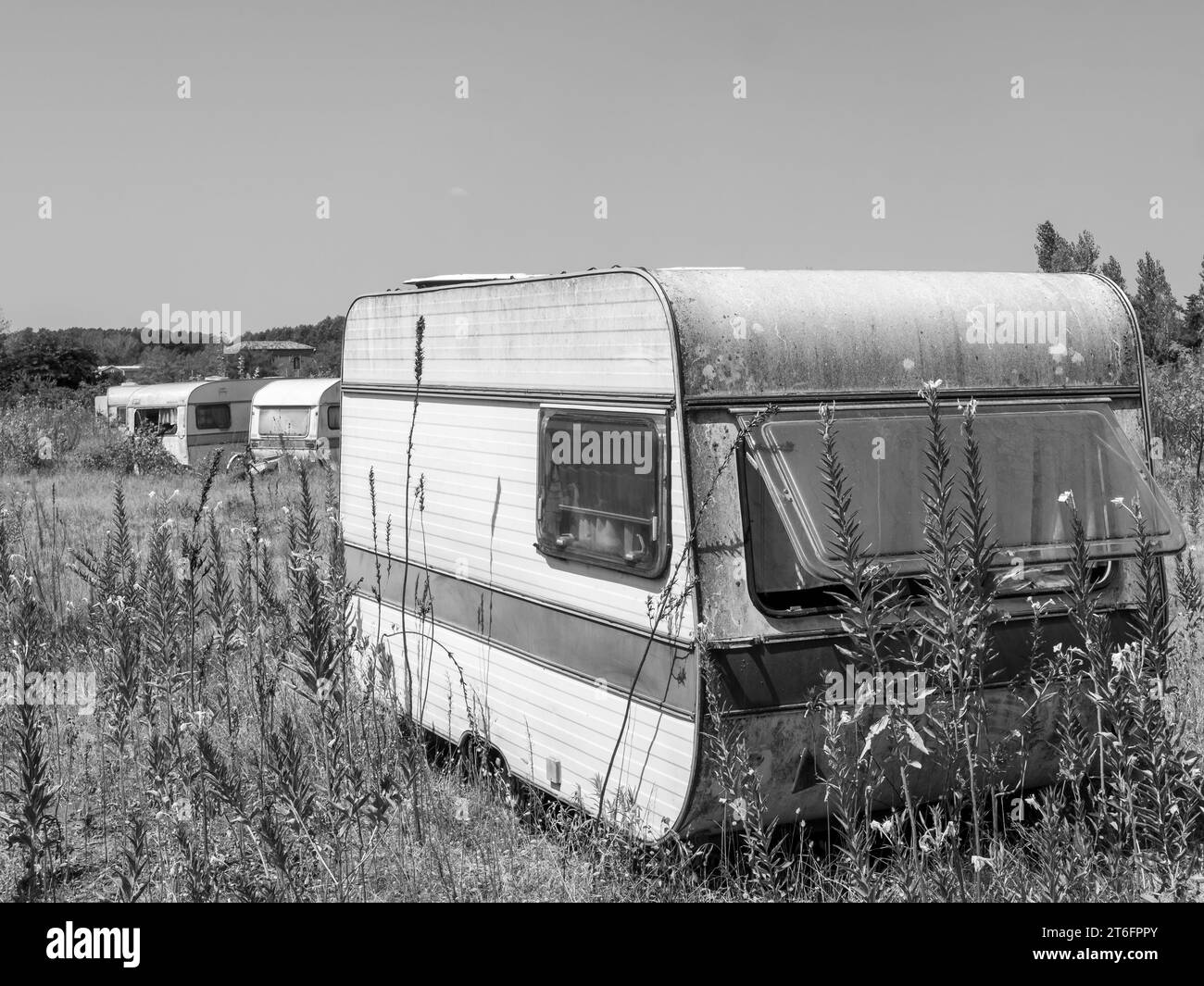 old abandoned caravan in the nature Stock Photo - Alamy