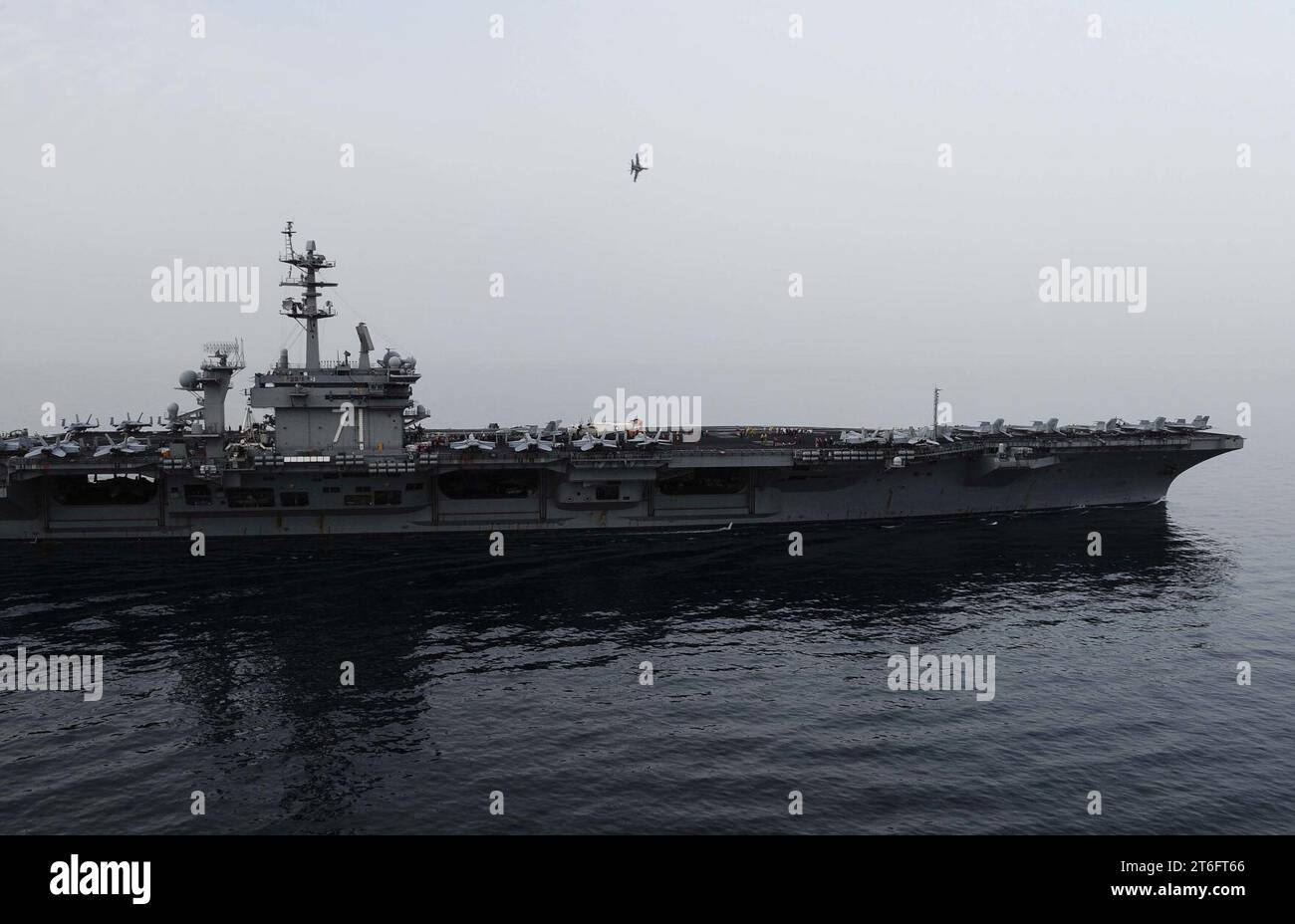 USS Theodore Roosevelt (CVN 71) sails in the U.S. 5th Fleet area of ...