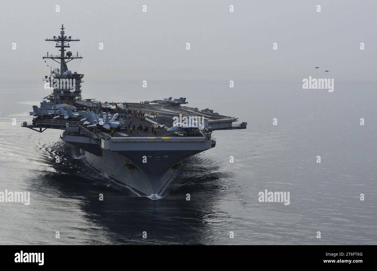 USS Theodore Roosevelt (CVN 71) sails in the U.S. 5th Fleet area of ...