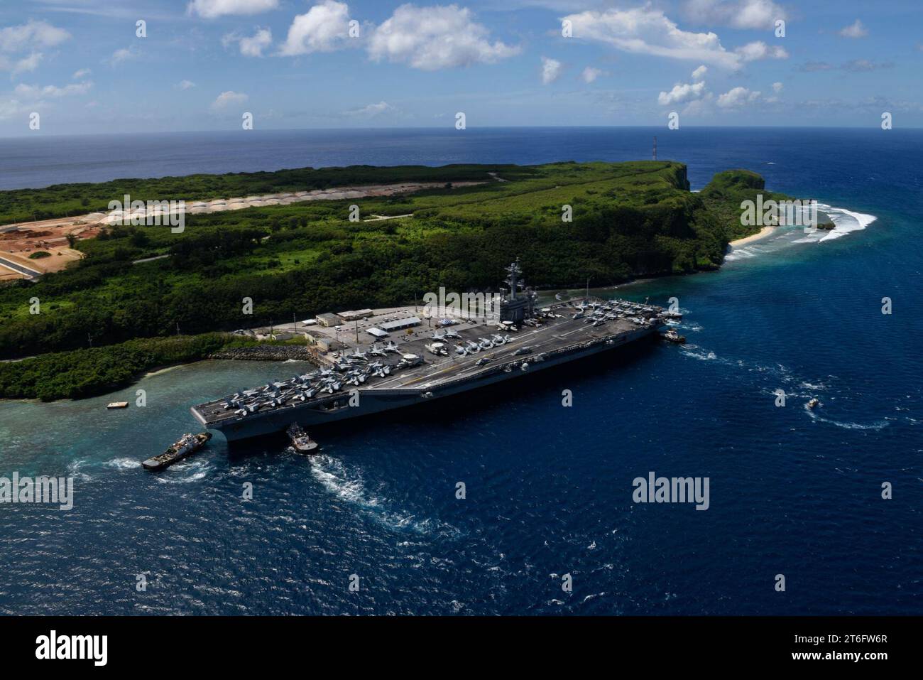USS Theodore Roosevelt departs Guam (38157110212 Stock Photo - Alamy