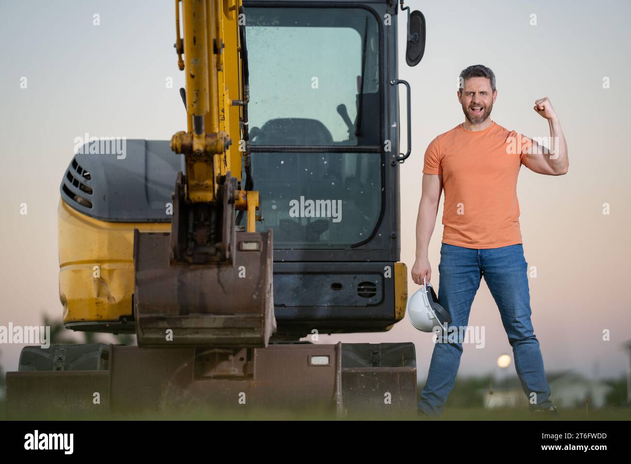Worker with bulldozer on site construction. Man excavator worker ...
