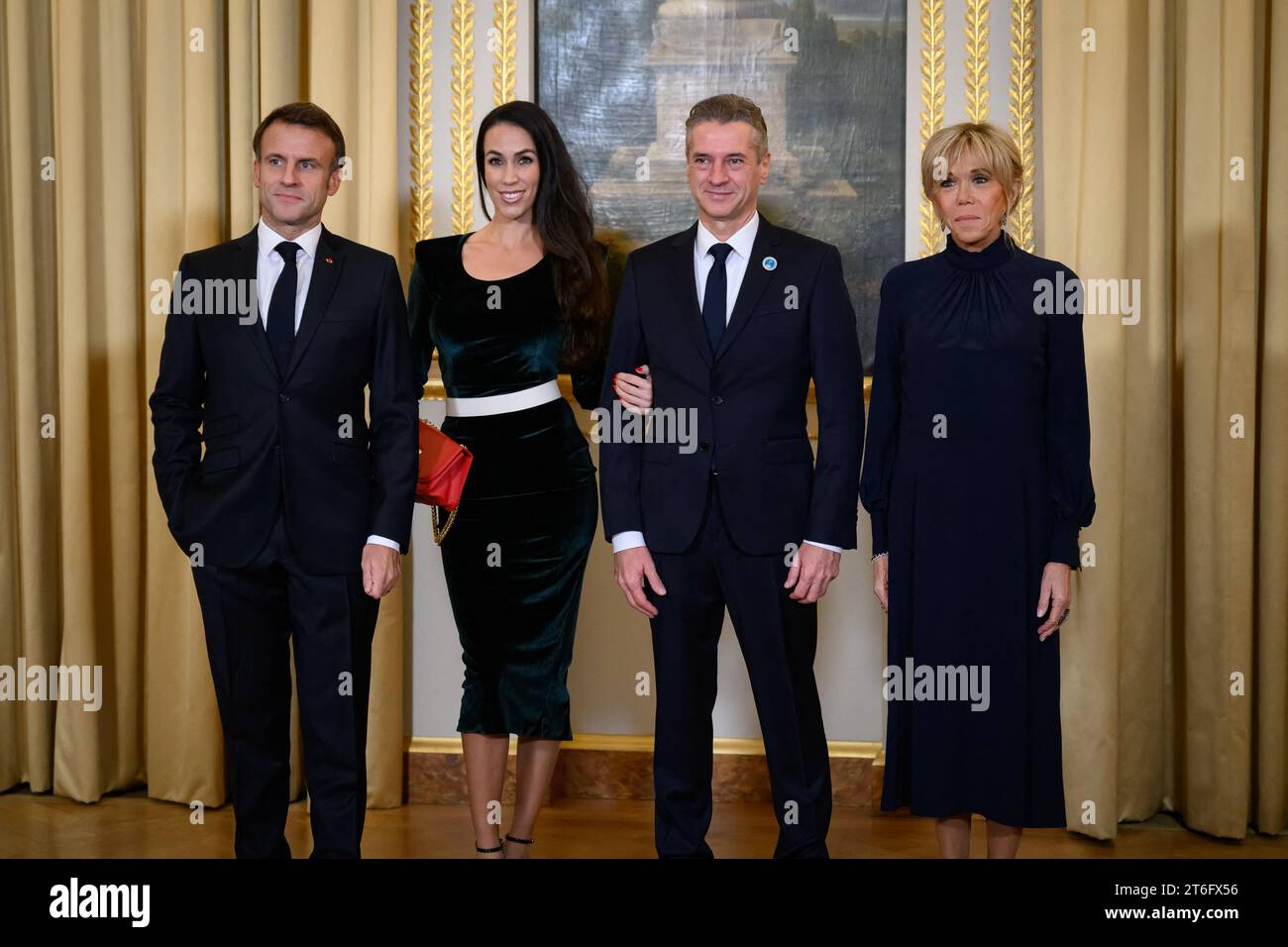 President Emmanuel Macron and his wife Brigitte with Robert Golob ...