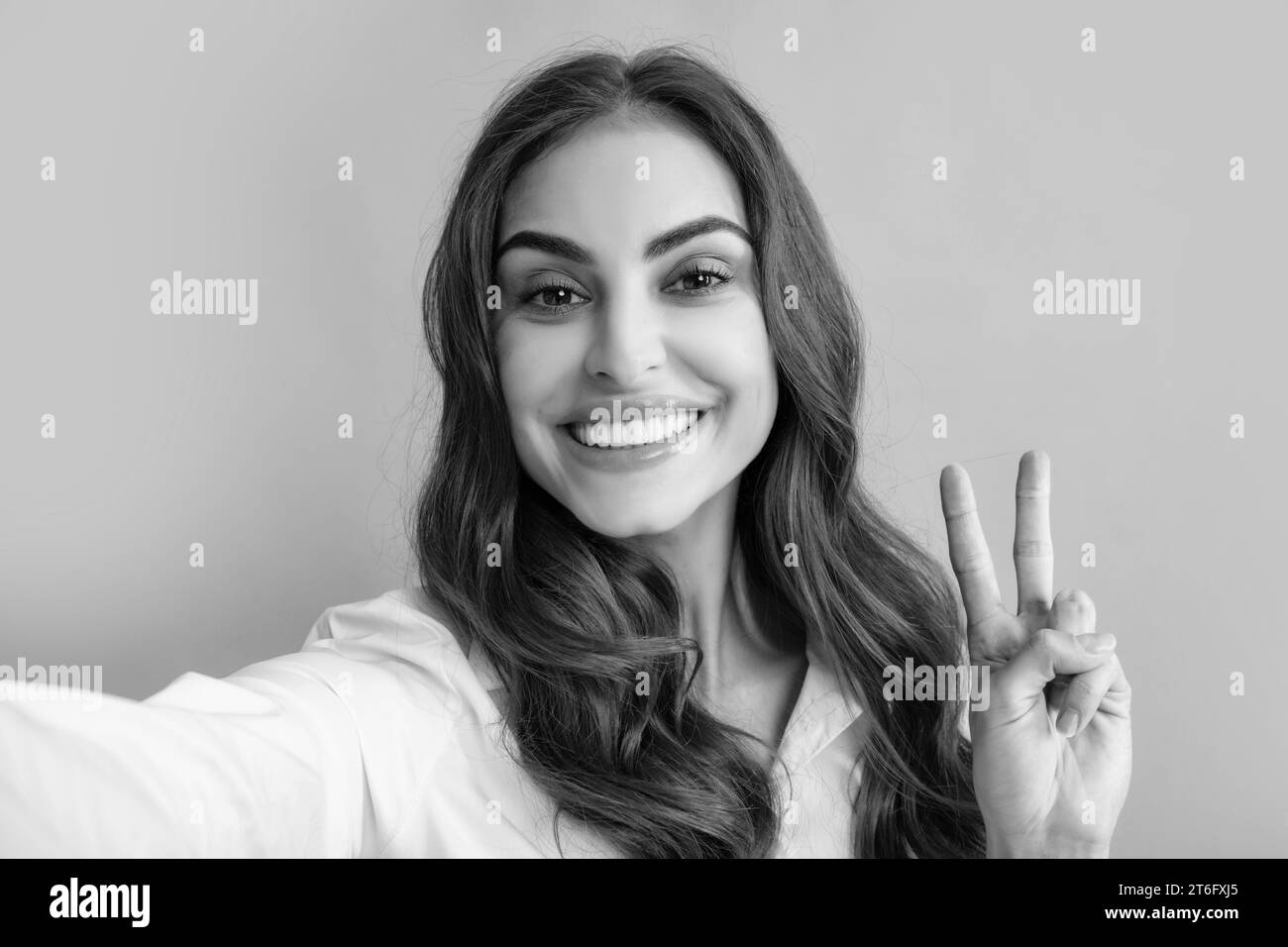 Portrait of cheerful smiling woman having video-call, shooting selfie ...