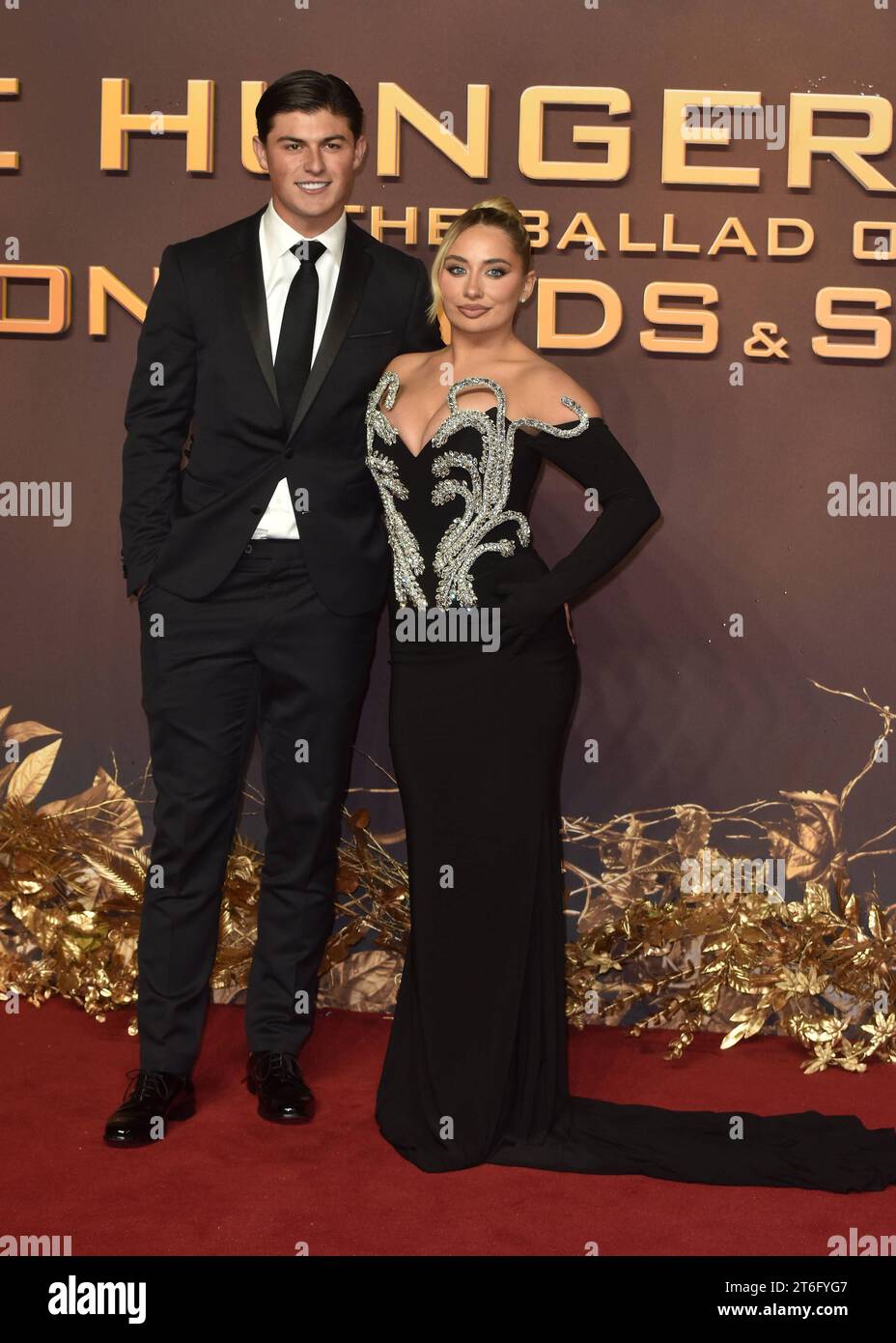 Louis Rees-Zammit and Saffron Barker attends The Hunger Games: The ...