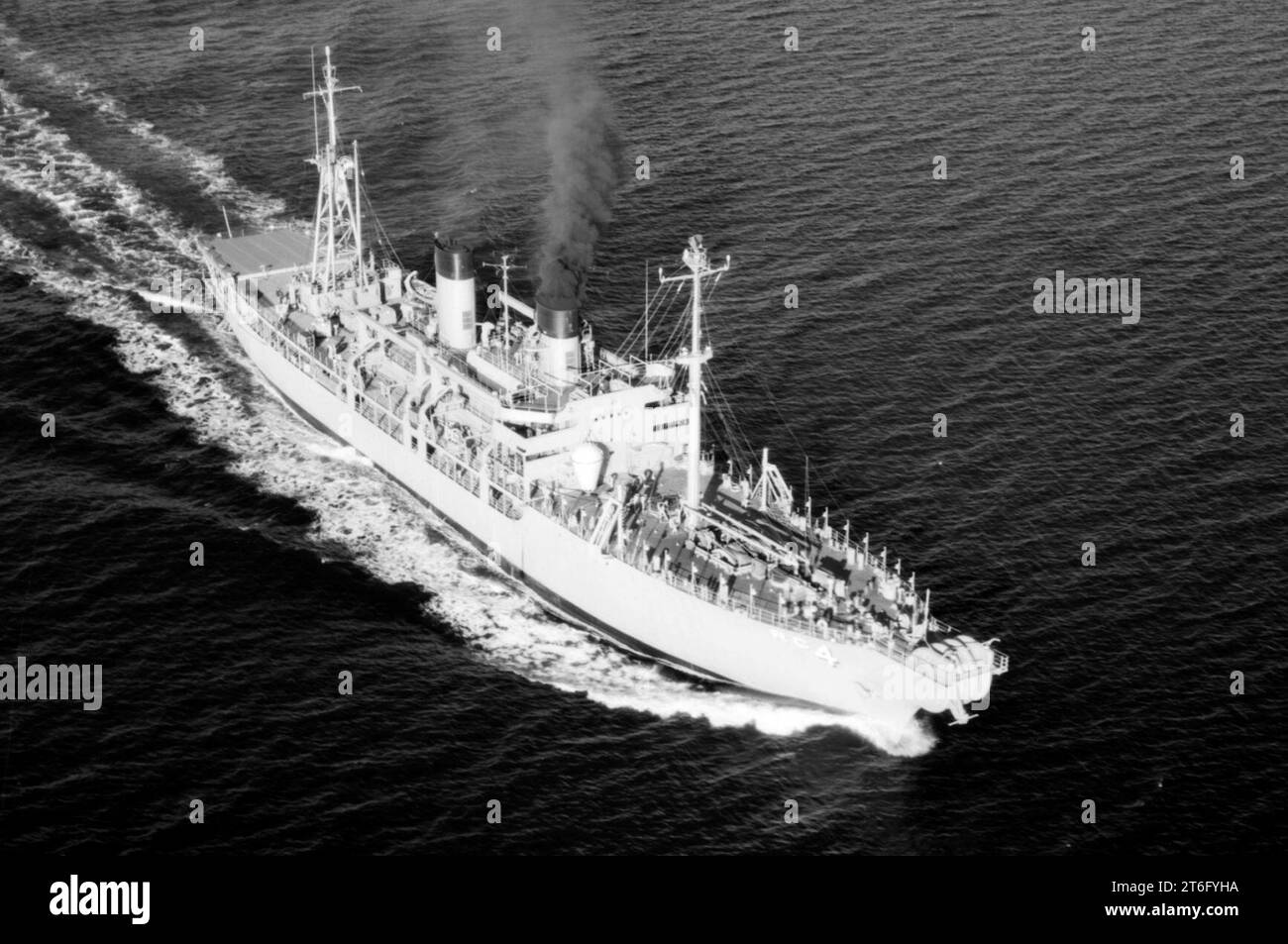 USS Thor (ARC-4) underway in Chesapeake Bay (USA), 12 December 1955 ...
