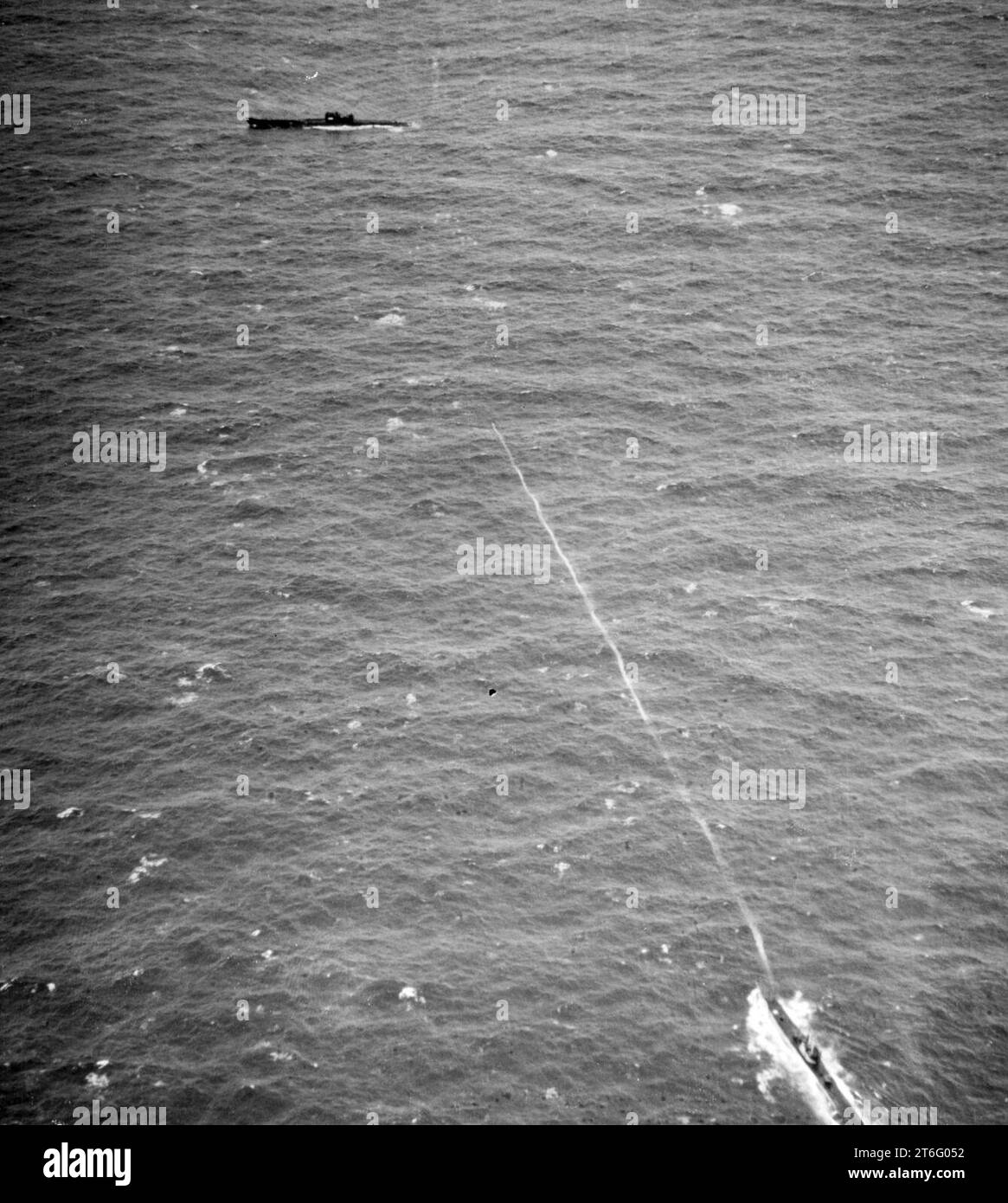 USS Toro (SS-422) torpedoes the surrendered German submarine U-530, 28 ...
