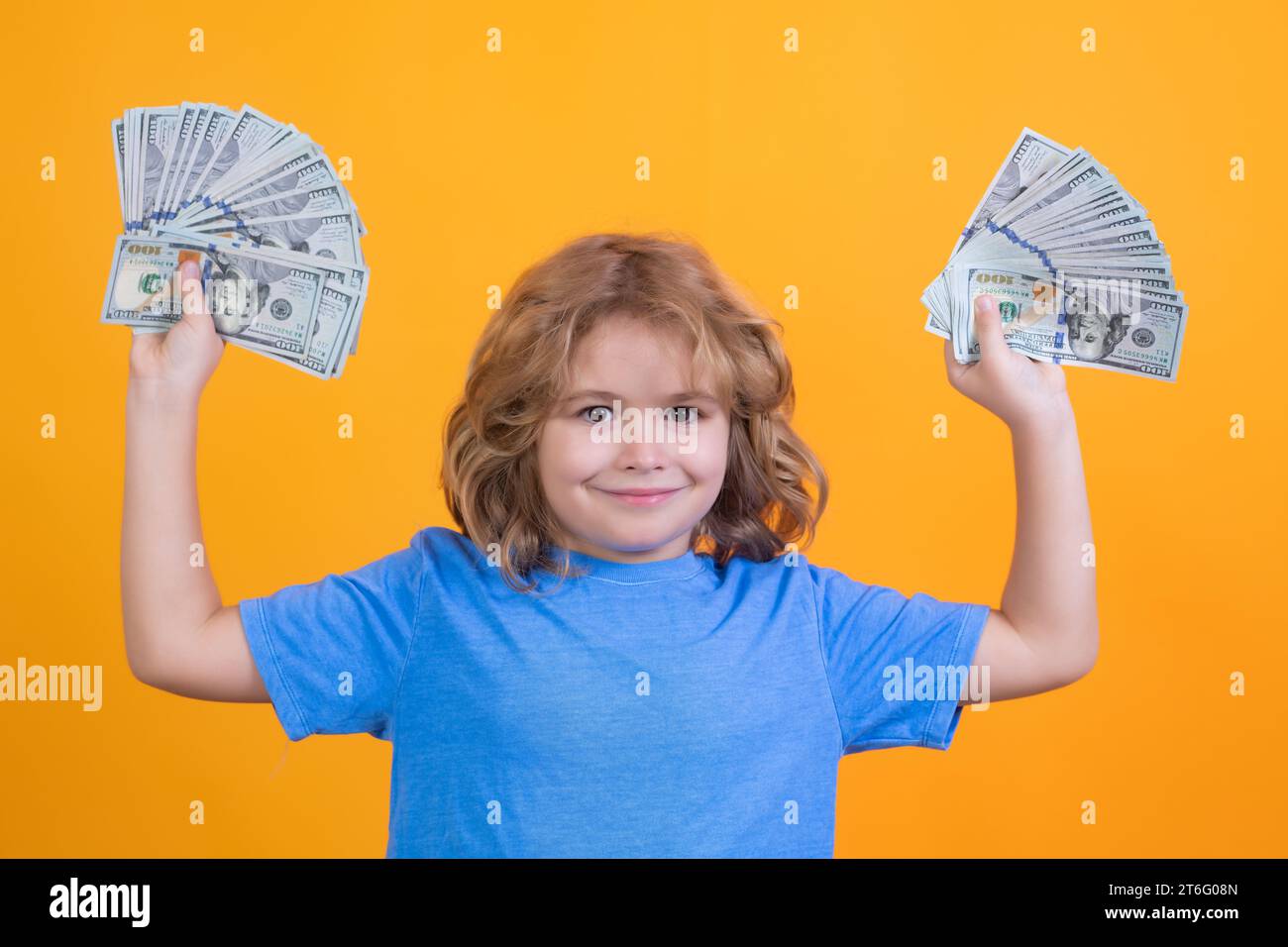 Money win, big luck. American dreams. Kid showing money dollar bills ...