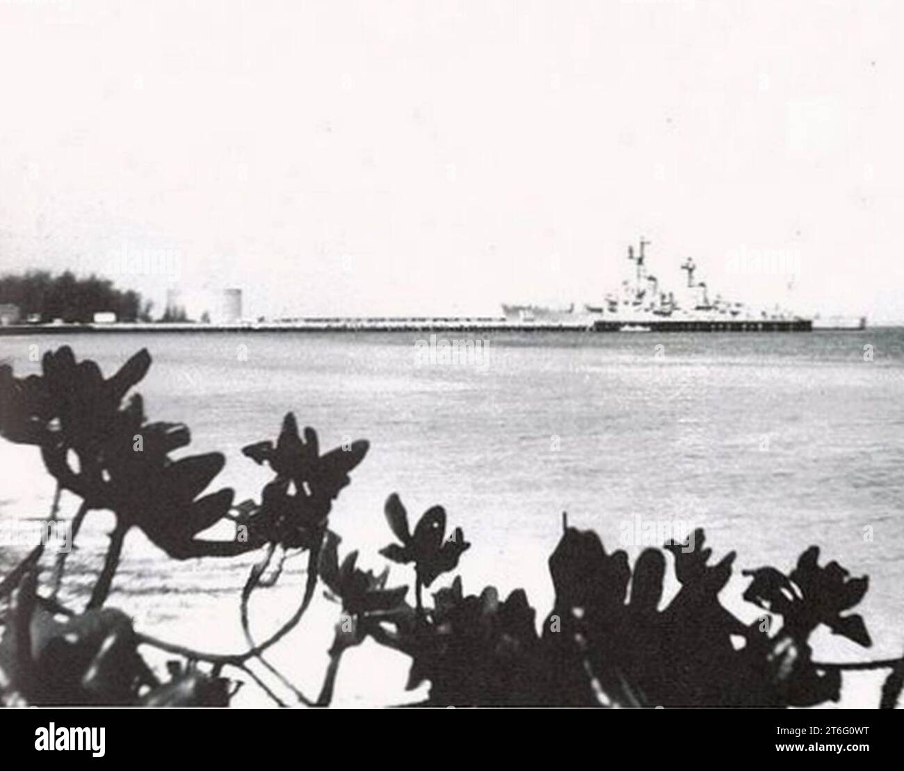 USS Turner Joy (DD-951) docked at Midway Atoll, circa in 1975 Stock ...
