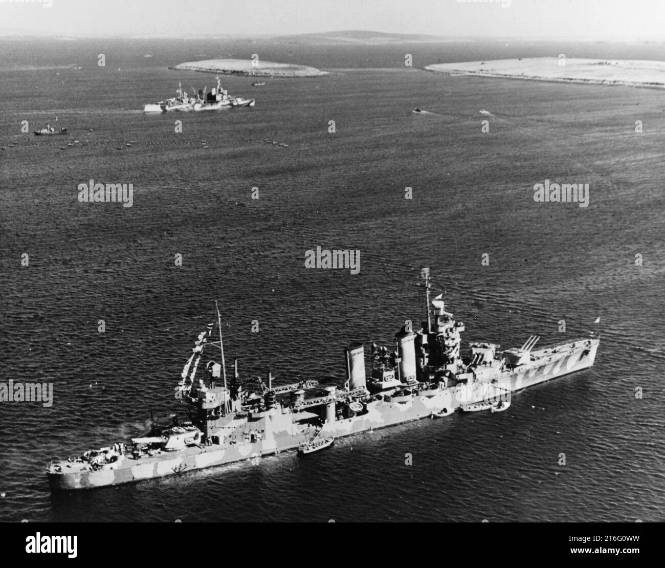 USS Tuscaloosa (CA-37) and HMS London (69) moored in Scapa Flow, in ...