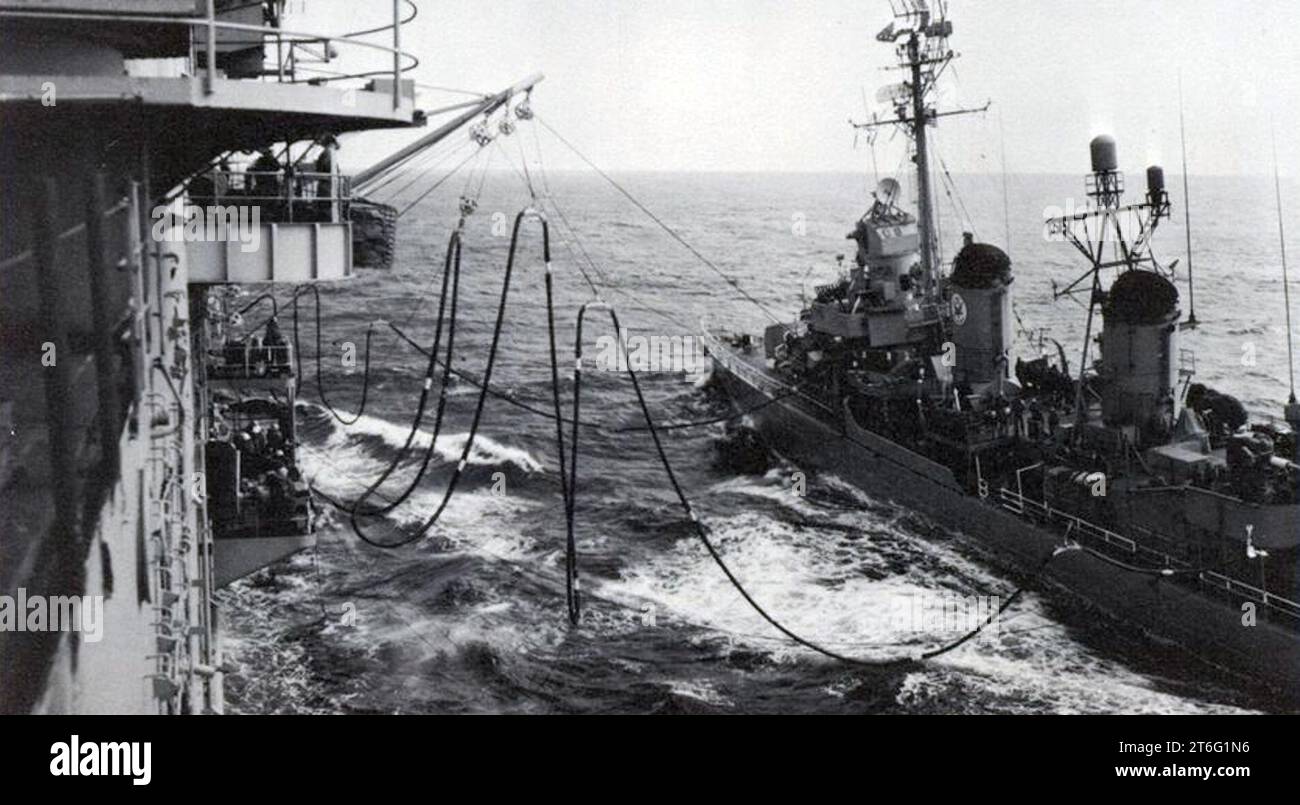 USS Valley Forge (LPH-8) refueling the USS O'Bannon (DD-450) in heavy ...