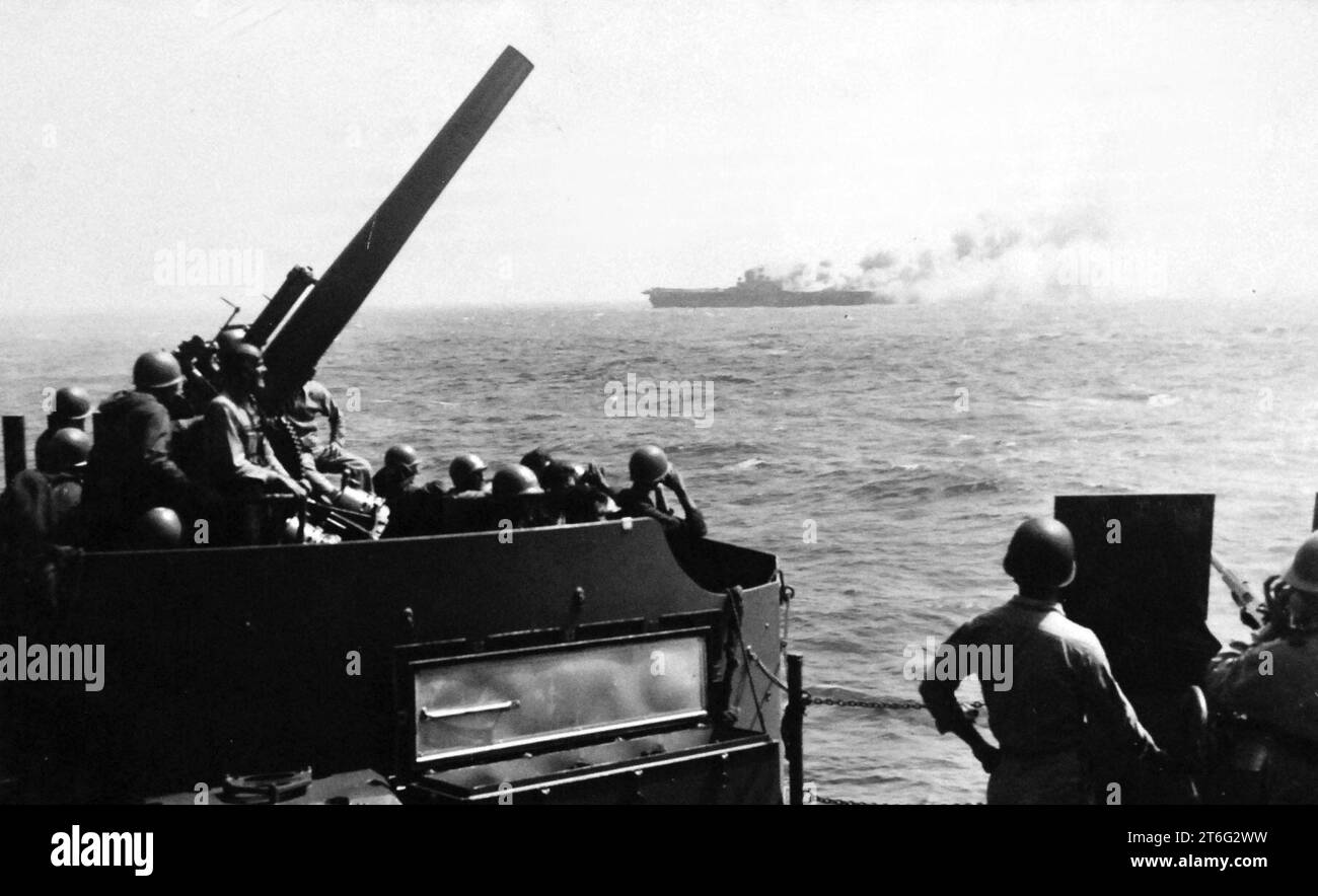 USS Wasp (CV-7) burning in the distance after being torpedoed, 15 ...