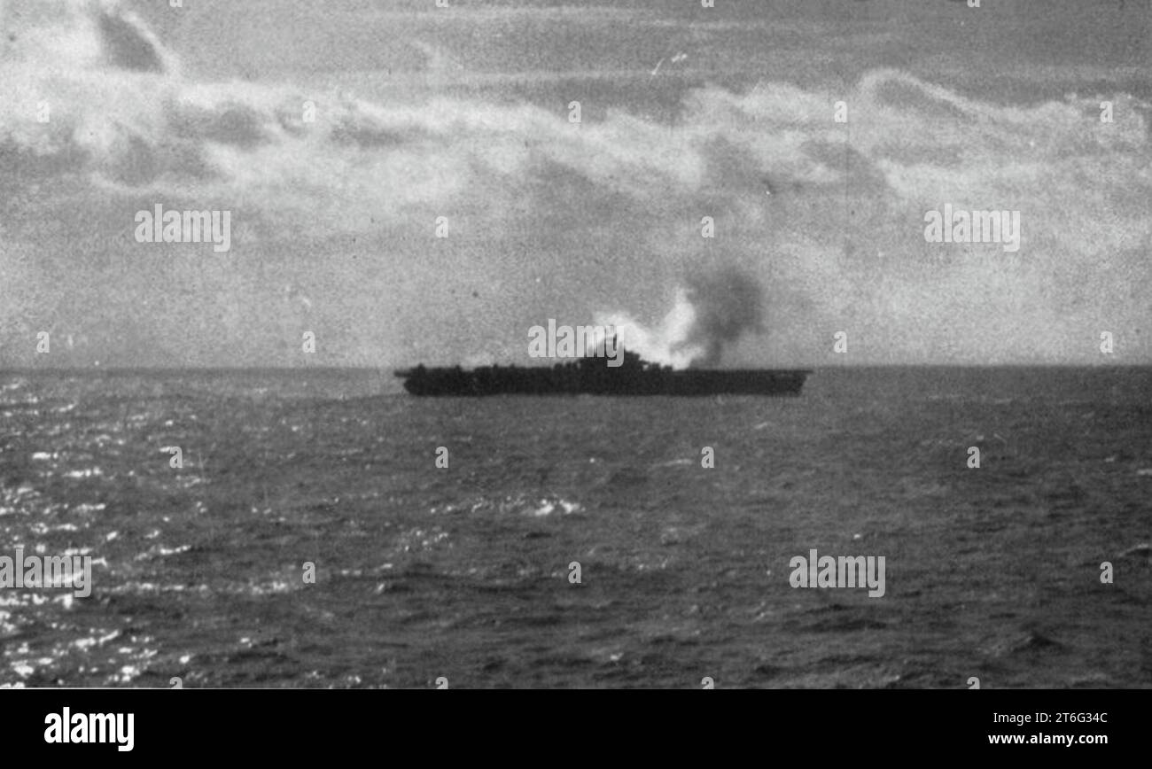 USS Wasp (CV-18) is hit by a Japanese 250kg bomb off Japan on 19 March ...