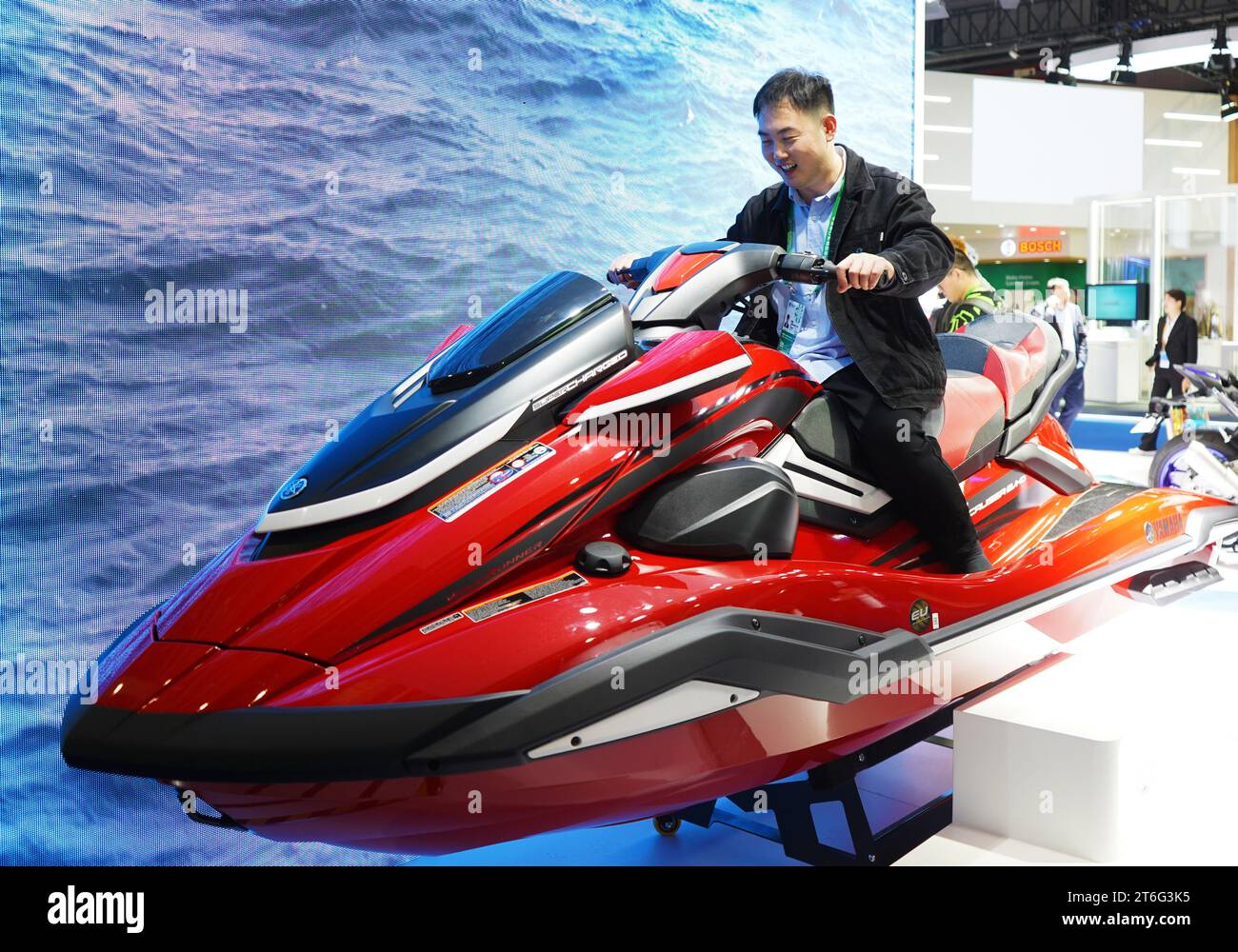 Shanghai. 10th Nov, 2023. A visitor tries a FX Cruiser SVHO of Yamaha ...