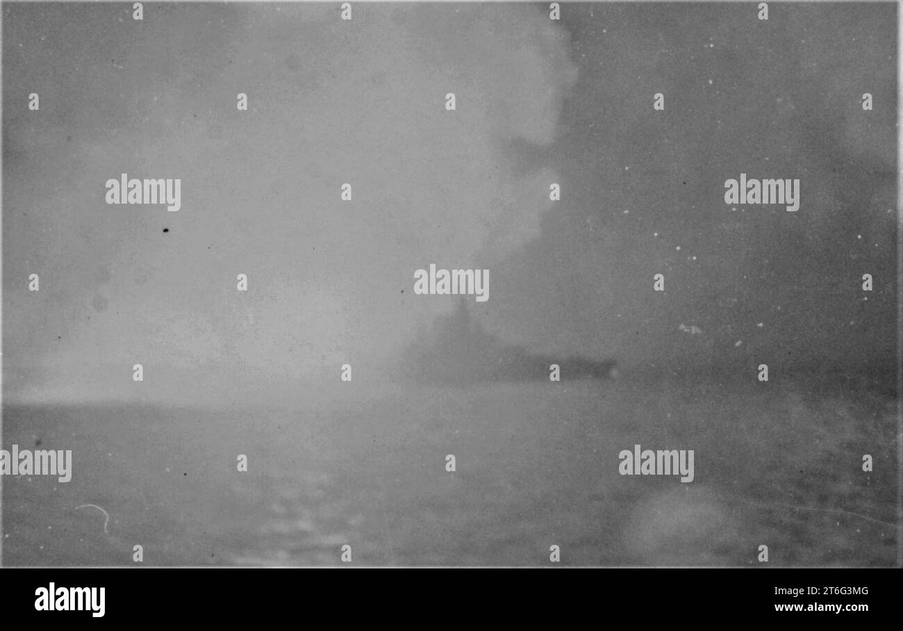 USS West Virginia (BB-48) firing during the Battle of Surigao Strait in ...