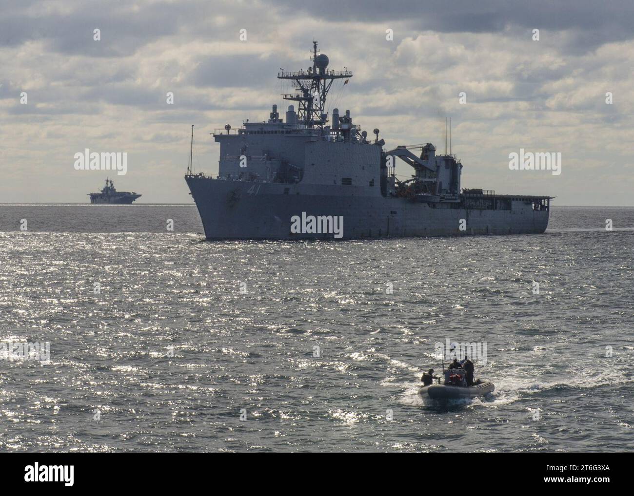 USS Whidbey Island conduct small boat operations with the amphibious ...