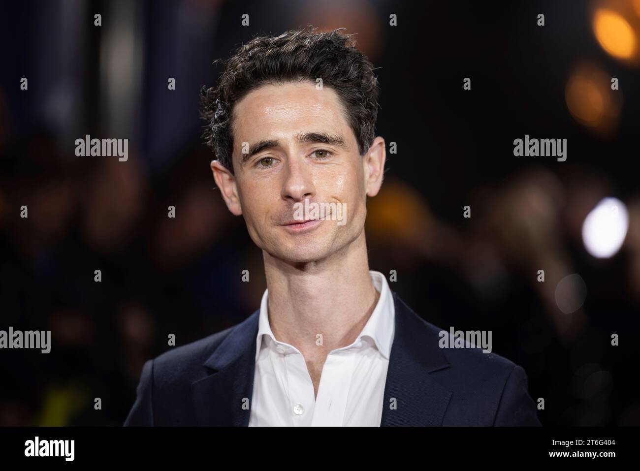 Writer Michael Lesslie poses for photographers upon arrival at the ...