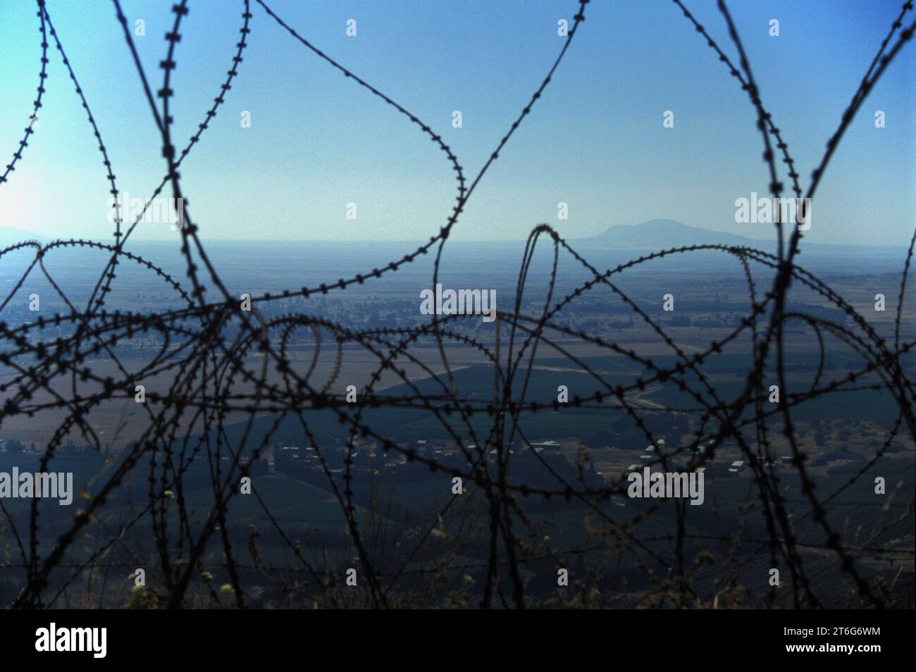 Looking into Lebanon through barbed wire, from Israel-controlled Golan ...