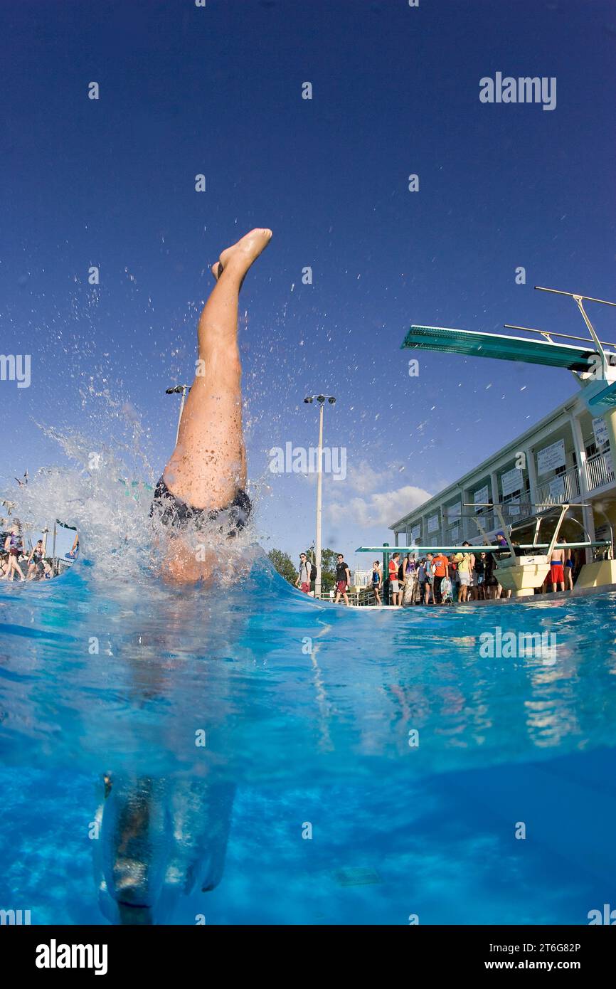Diver entering water from underwater hi-res stock photography and ...