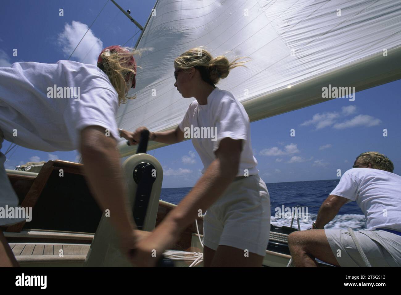 Crew action onboard sailboat Stock Photo - Alamy