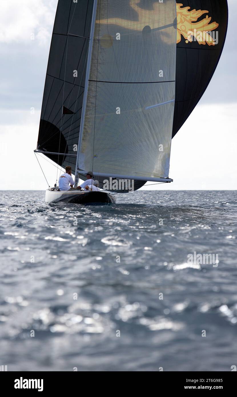 Sailing downwind on a yacht off the coast of Antigua Stock Photo - Alamy