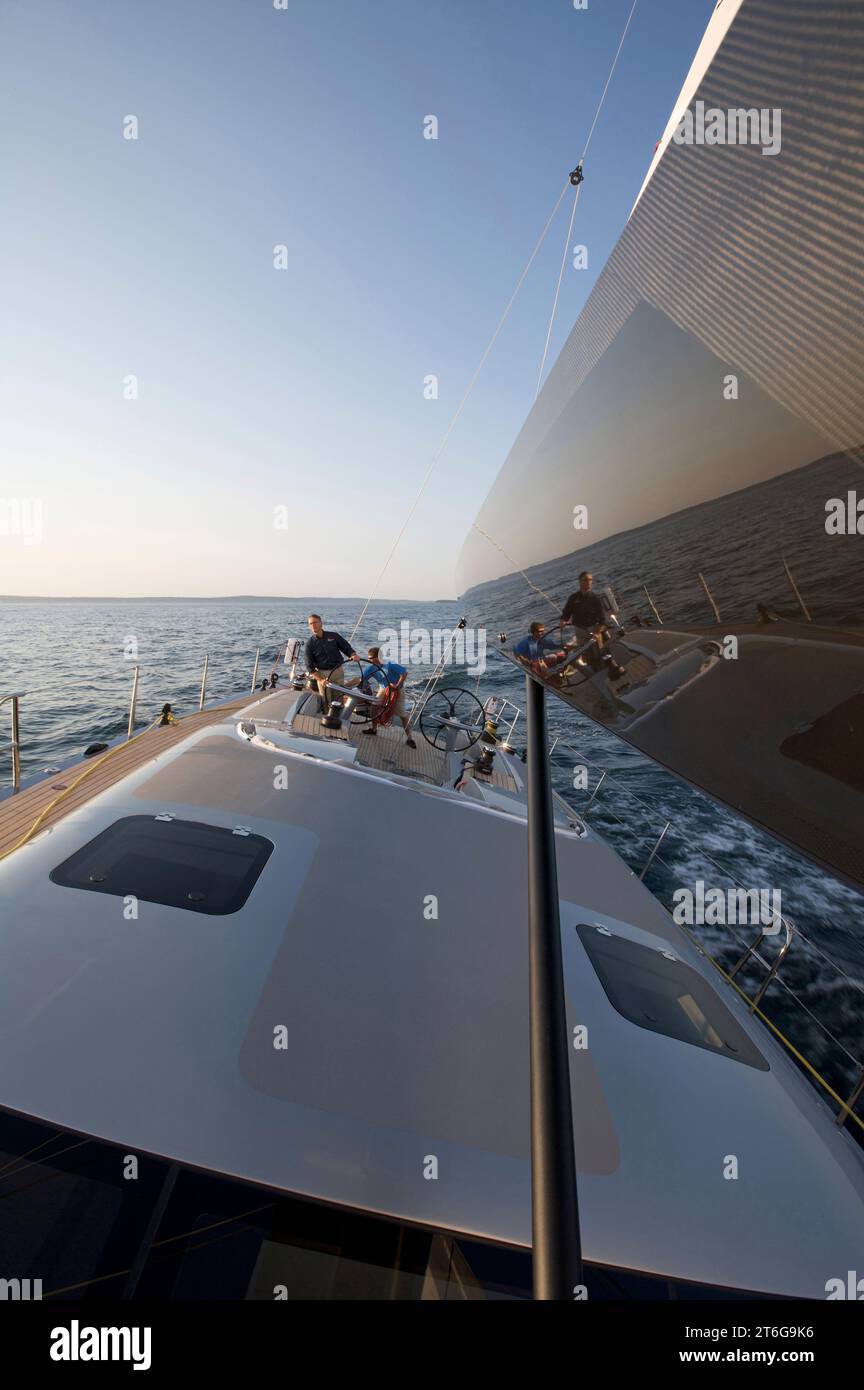 Crew races modern ocean-going sailing yacht in the Gulf of Maine Stock ...