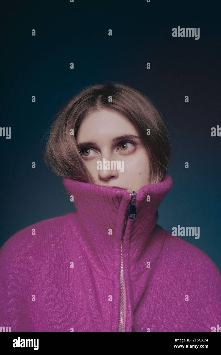 Portrait of a sad woman in warm sweater. Beauty and winter concept ...