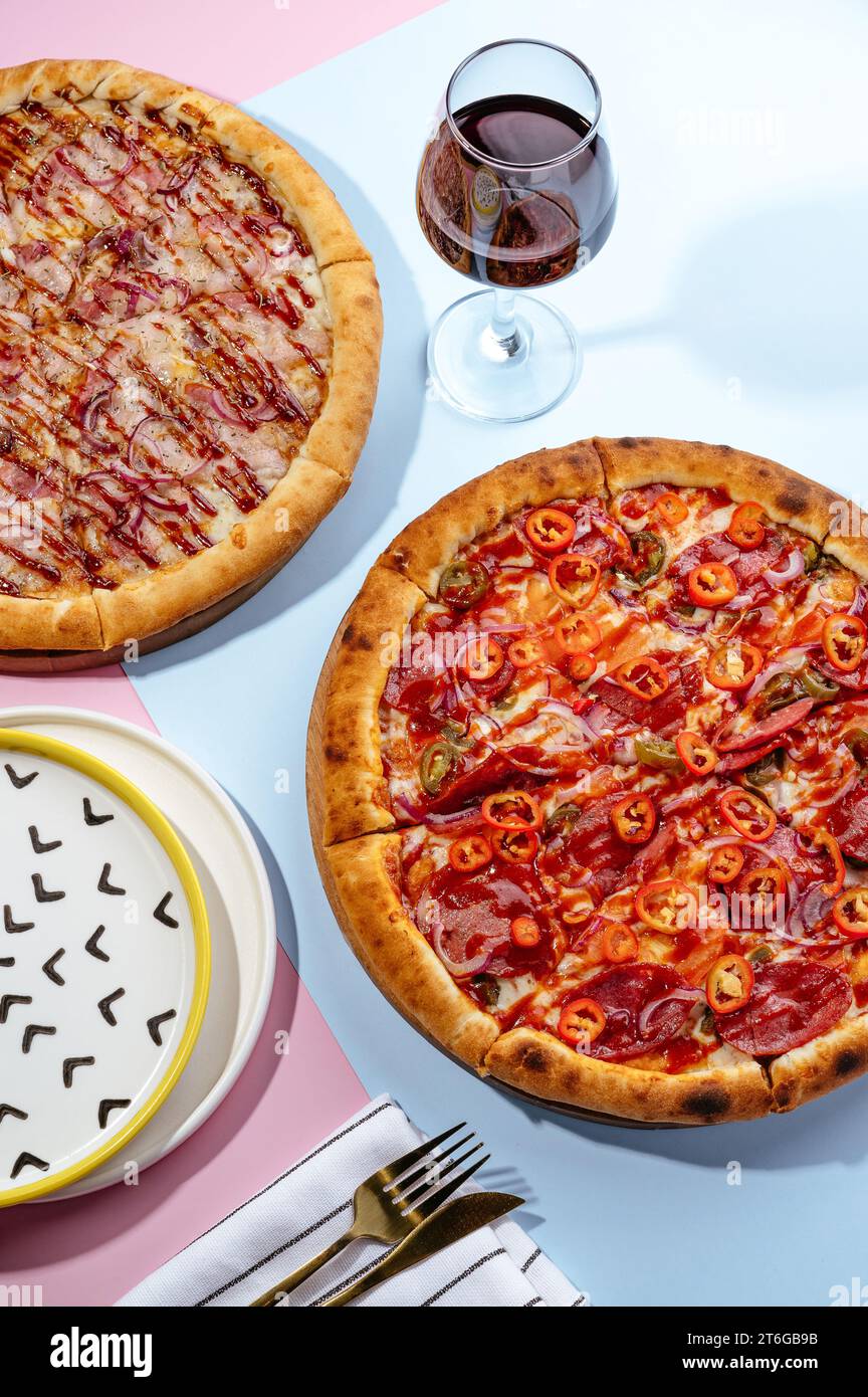 italian traditional pizza on a colored background Stock Photo - Alamy