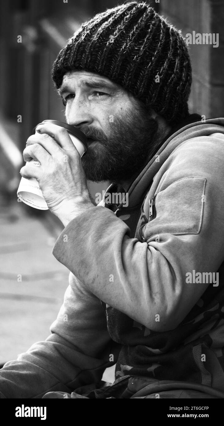 Destitution in the city centre of Cardiff. A homeless man on the ...